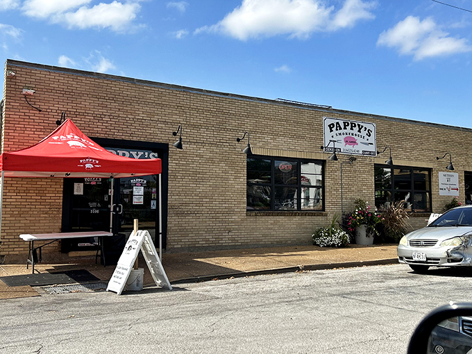 The unassuming yellow brick exterior of Pappy's Smokehouse hides a barbecue paradise within. That line of people? They know something you should too.