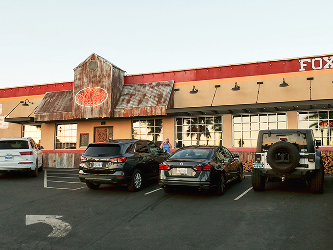 That neon pig sign isn't just decoration&mdash;it's a beacon of hope for the barbecue-deprived, glowing like a meaty North Star in Boulder City's night sky.