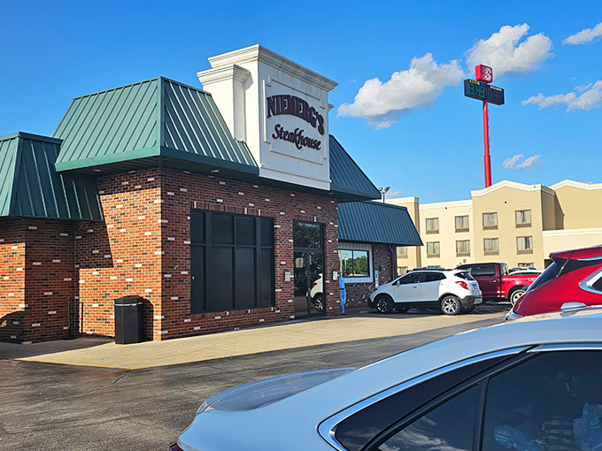 The classic brick-and-green exterior of Niemerg's stands like a culinary lighthouse for hungry travelers. Interstate driving never had such a delicious destination waiting at the end.