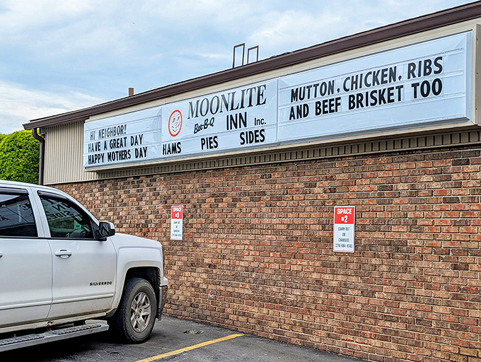 The unassuming exterior of Moonlite Bar-B-Q Inn hides a Kentucky treasure that's been perfecting smoky delights since 1963. Barbecue paradise awaits!