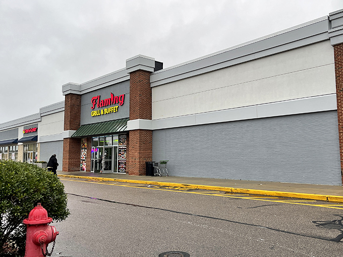 The humble brick facade of Flaming Grill & Buffet belies the culinary wonderland waiting inside. First rule of buffet club: never judge by the exterior.