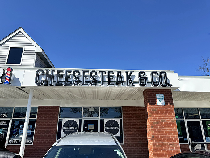 The bold signage announces your arrival at cheesesteak paradise. No fancy frills needed when what's inside speaks volumes. 