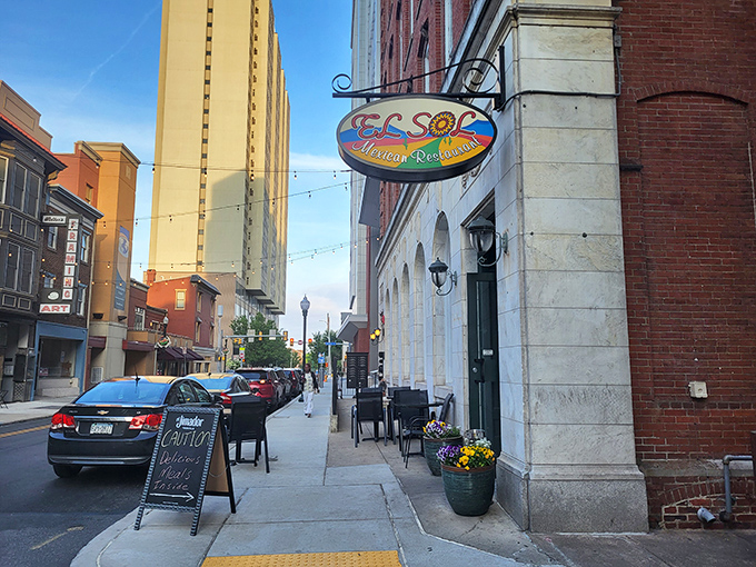 El Sol's modest storefront belies the culinary treasures within. Those string lights aren't just decoration&mdash;they're beacons guiding hungry souls to enchilada nirvana.