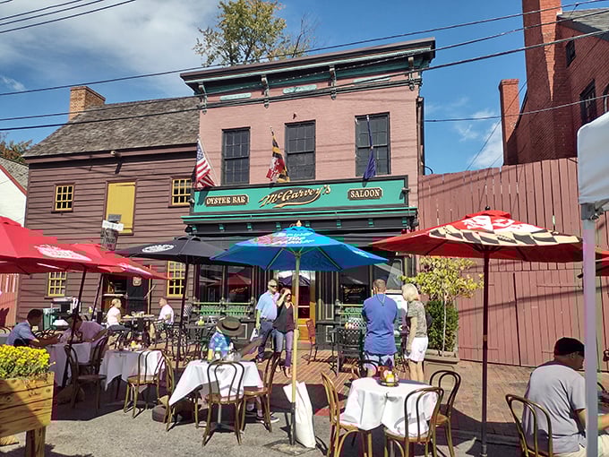 McGarvey's pink brick exterior with its signature green awning stands as a beacon for seafood lovers in historic downtown Annapolis.