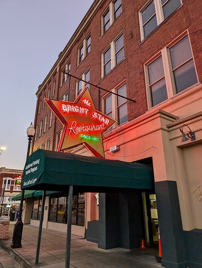 The iconic star-shaped neon sign glows like a beacon for hungry travelers. This isn't just a restaurant&mdash;it's a Bessemer landmark that's been calling folks home since 1907.