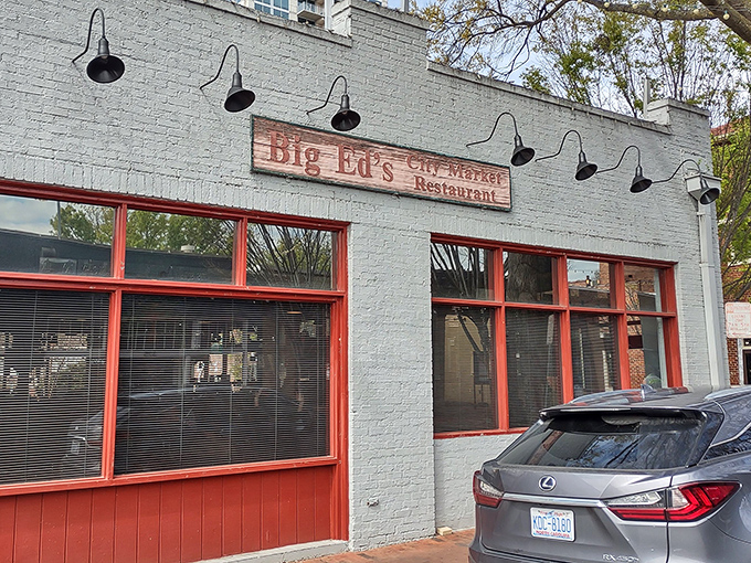 Big Ed's mint-green exterior with red-trimmed windows might not scream "culinary destination," but locals know this unassuming facade hides Southern food paradise inside.