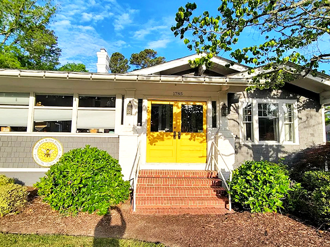 The sunny yellow doors of The Bee and The Biscuit beckon like a Southern grandmother waving you in for Sunday supper. Pure cottage charm!