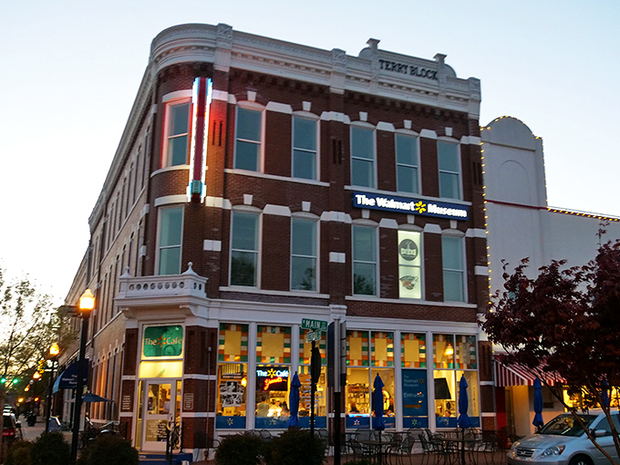 The corner brick building stands like a sentinel of sweetness, promising cold comfort on hot Arkansas afternoons with its classic soda fountain charm.
