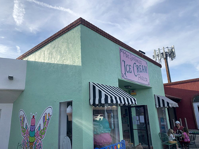 That mint-green facade with classic black and white awnings isn't just a building—it's a portal to simpler, sweeter times in Albuquerque.