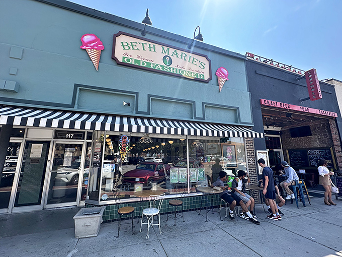 The mint-green facade with those iconic ice cream cone signs is like a beacon of sweetness on Denton's historic square.