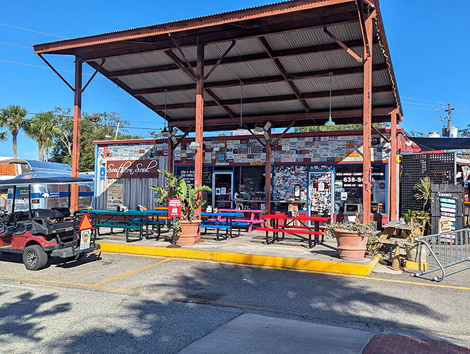 The pilgrimage begins here. Southern Soul's weathered exterior and license plate collection tell you immediately: this isn't just dinner, it's a destination. 