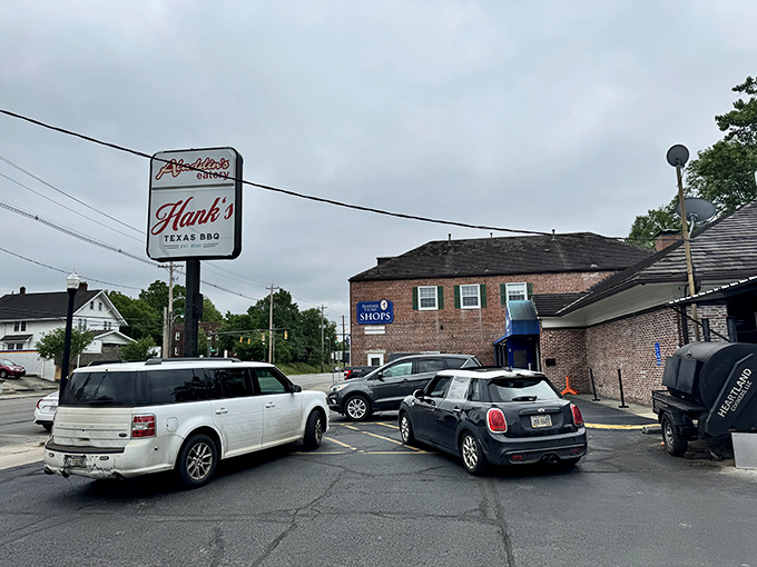 The blue awning of Hank's Texas BBQ beckons like a smoke signal to hungry Columbus residents. BBQ paradise hides in plain sight.
