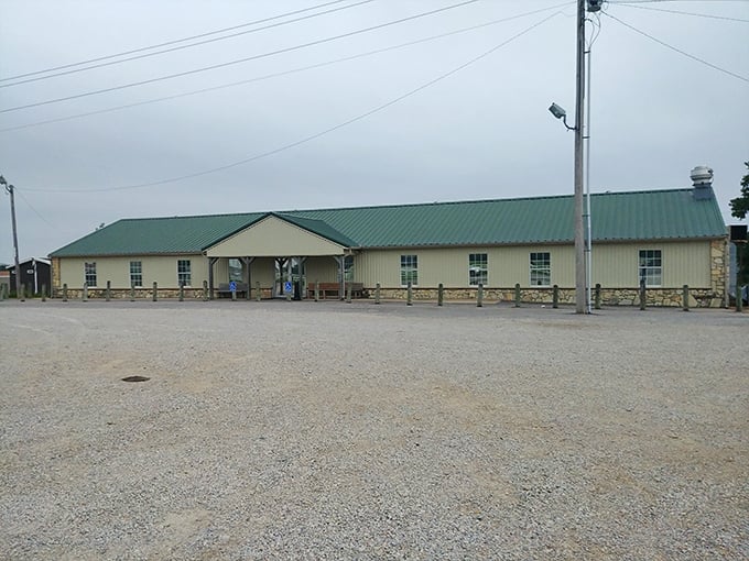 The unassuming exterior of BG's Catch stands like a beacon for hungry travelers, with its iconic fish sign promising seafood salvation in Kingston.
