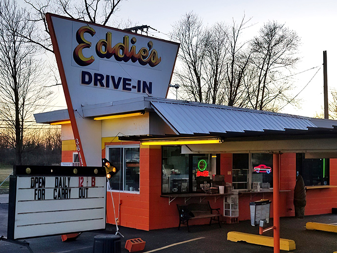 Eddie's iconic orange exterior isn't just a building&mdash;it's a time machine disguised as a drive-in, beckoning hungry travelers with its retro charm and promise of burger bliss.