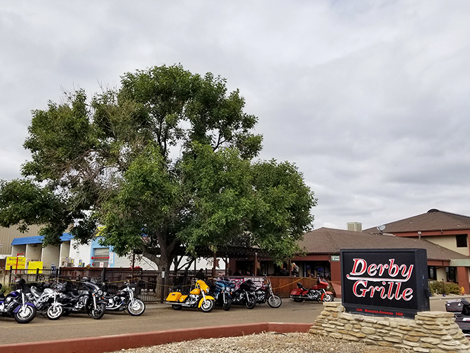 The Derby Grille stands ready for hungry visitors, with motorcycles lined up outside like dinner guests who couldn't wait to get a table. 