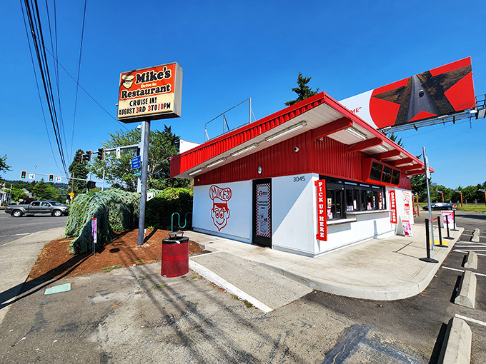 The iconic red exterior of Mike's Drive-In stands as a beacon of burger bliss in Milwaukie, promising nostalgic flavors that never go out of style.
