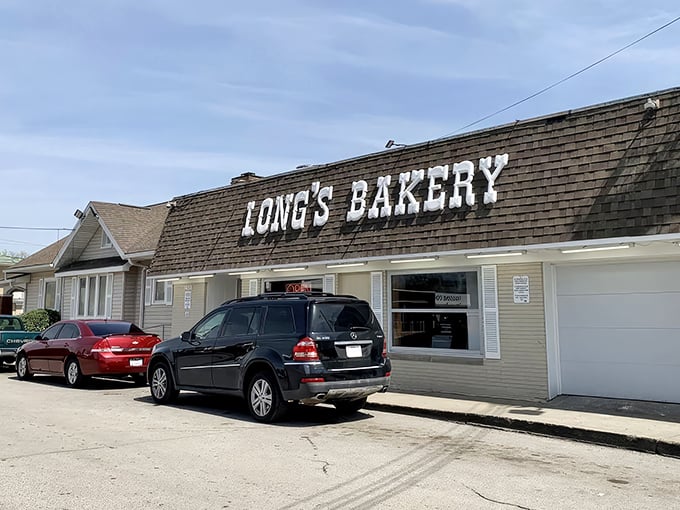 The unassuming exterior of Long's Bakery belies the sugar-fueled magic happening inside. Like finding a winning lottery ticket in your coat pocket.