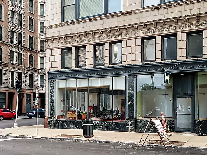The historic downtown storefront beckons like a siren song for donut lovers, with its classic architecture making it look like the Federal Reserve of Fried Dough.