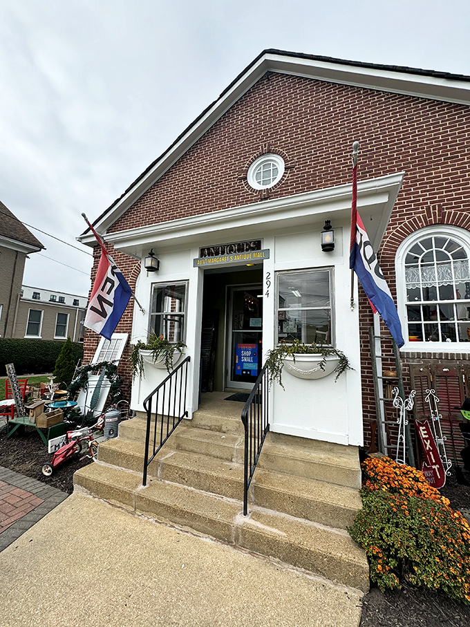The charming brick exterior of Aunt Margaret's beckons with its round window and vintage lanterns&mdash;like a time portal disguised as a building.
