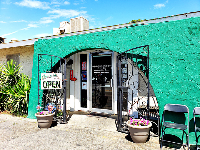 The turquoise exterior of Scotts Diner stands out like a culinary oasis in Merced, beckoning hungry travelers with its charming retro vibe. 