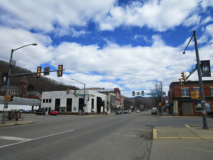 Historic brick storefronts line Emporium's main street, where Guppy's Clothes offers small-town retail therapy without big-city price tags.