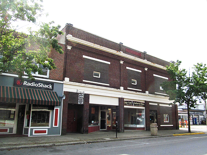 Historic brick storefronts line Emporium's main street, where Guppy's Clothes offers small-town retail therapy without big-city price tags.