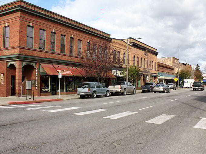 Historic brick buildings stand sentinel in downtown Sandpoint, where your Social Security check stretches further than your last attempt at yoga.