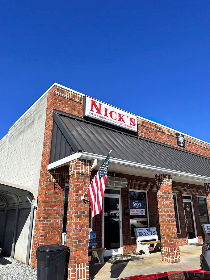 The humble brick exterior of Nick's might not scream "burger mecca," but locals know that culinary treasures often hide behind modest facades.