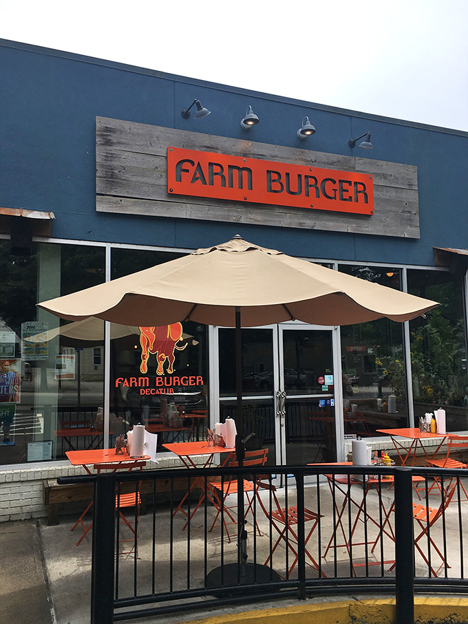 The blue facade with that rustic wooden sign is like a beacon for burger lovers. Farm-to-table isn&rsquo;t just a buzzword here&mdash;it&rsquo;s a delicious promise.