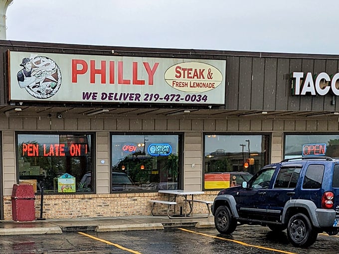 The unassuming storefront that houses flavor explosions within. That glowing "OPEN" sign might as well say "Happiness Available Here."