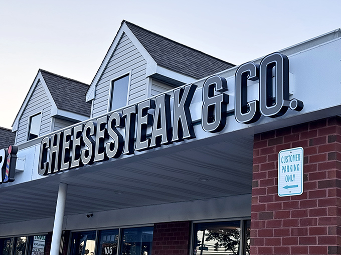 The bold signage announces your arrival at cheesesteak paradise. No fancy frills needed when what's inside speaks volumes. 
