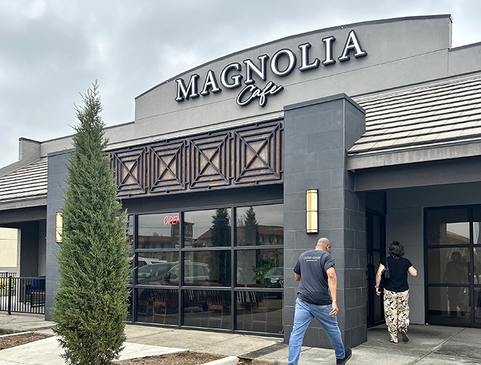 The sleek gray exterior of Magnolia Cafe stands like a culinary beacon in Wichita, promising delicious adventures within. That evergreen isn't just decoration&mdash;it's your first hint of the freshness awaiting inside.