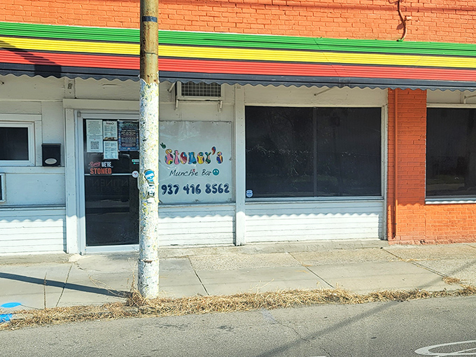 The unassuming brick exterior with its vibrant Jamaican-inspired trim is like a culinary treasure map &ndash; X marks the spot where flavor lives.