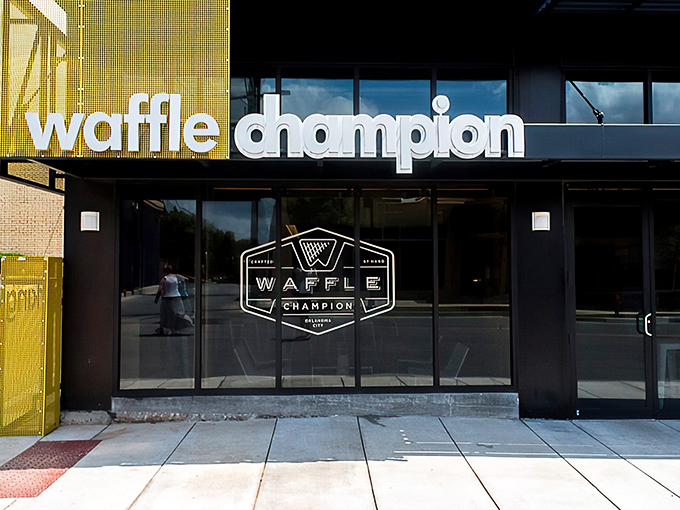 The blue waffle grid beckons like a geometric lighthouse, guiding hungry souls to breakfast nirvana in Oklahoma City.