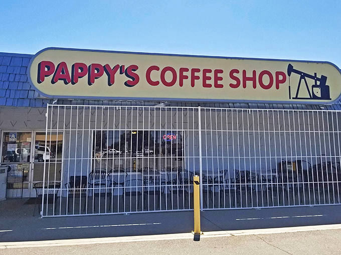 The unassuming blue-roofed exterior of Pappy's Coffee Shop stands like a culinary lighthouse in Bakersfield, promising honest food without the fanfare.
