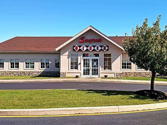 The classic diner facade beckons like an old friend. That iconic "DINER" sign might as well say "Come in, we've got gravy."