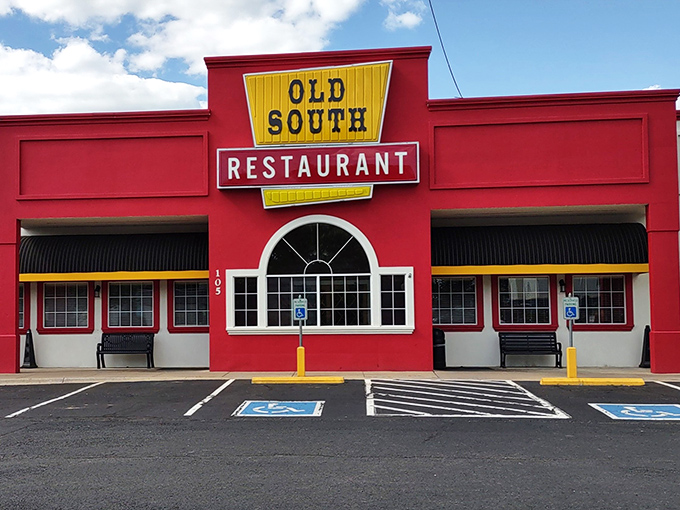 The bright red exterior with bold yellow signage isn't trying to be subtle &ndash; it's proudly announcing "good food happens here!" No Instagram filter required.