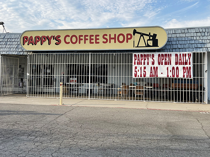 The unassuming blue-roofed exterior of Pappy's Coffee Shop stands like a culinary lighthouse in Bakersfield, promising honest food without the fanfare.