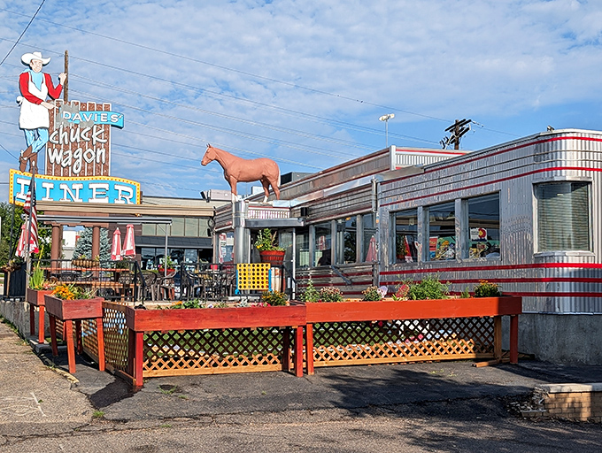 That iconic neon cowboy isn't just showing you where to eat &ndash; he's been inviting hungry travelers to pull over since Eisenhower was president.