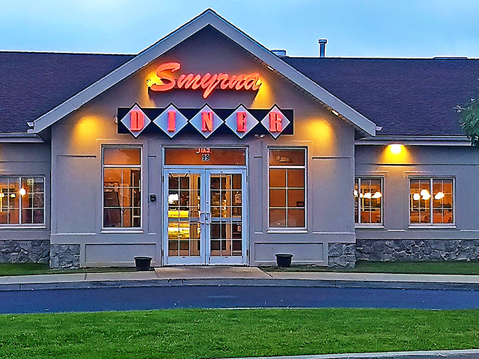 The classic diner facade beckons like an old friend. That iconic "DINER" sign might as well say "Come in, we've got gravy."