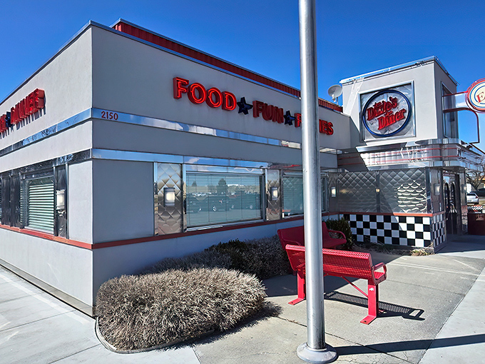 The bright red "FOOD ★ FUN ★ FIFTIES" sign isn't just advertising&mdash;it's a time portal promising your stomach the vacation it deserves.