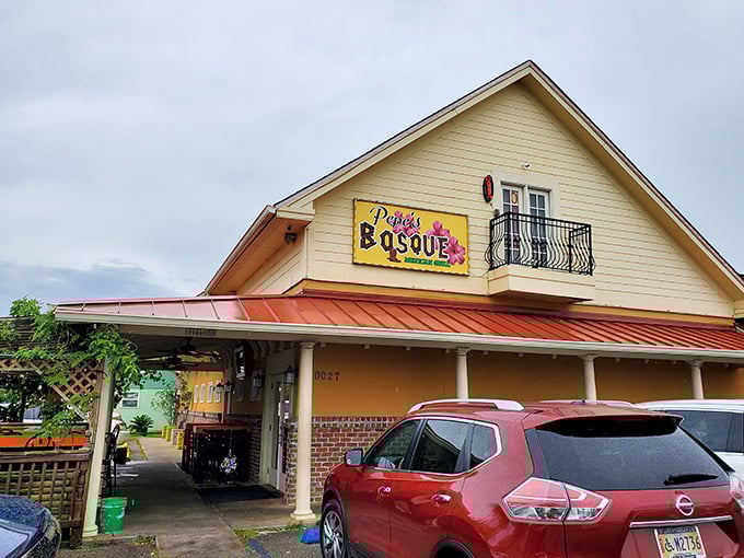 The cheerful yellow exterior of Pepe's Bosque beckons like an old friend, complete with a colorful patio that promises good times ahead. 