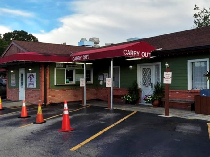 The unassuming exterior of Yoder's belies the culinary treasures within. Like finding a Picasso at a yard sale, this modest green building houses flavor masterpieces.