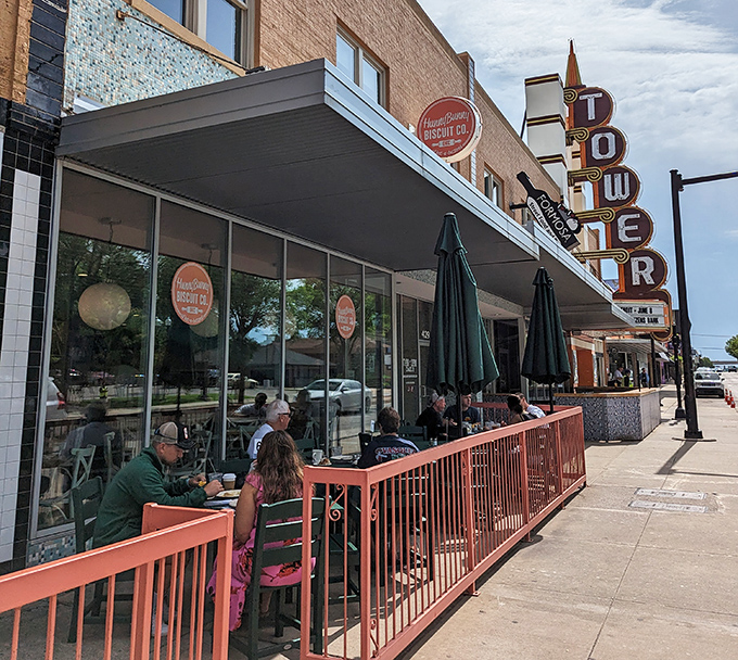 The cheerful yellow exterior with teal accents isn't just eye-catching—it's a morning beacon for carb enthusiasts across Oklahoma City.