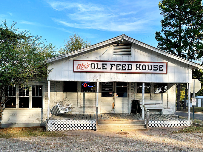 The unassuming exterior of Abe's Ole Feed House stands like a time capsule of Southern hospitality, complete with porch swing for pre-feast contemplation.