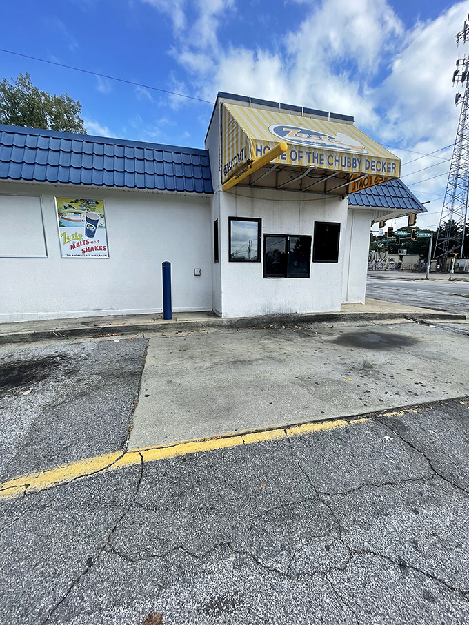 The distinctive blue roof and vintage cartoon chicken beckon like old friends. Zesto's East Atlanta location has the comforting permanence of a neighborhood landmark.