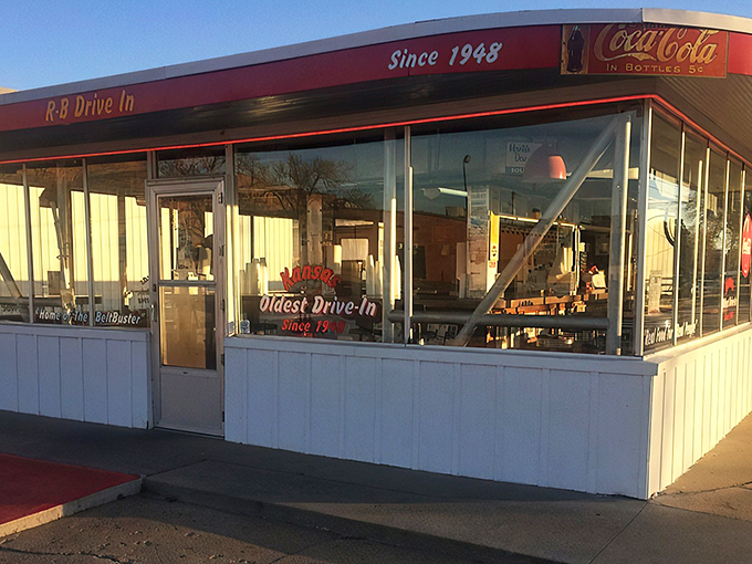 The iconic white building with red trim has been a Hutchinson landmark since 1948. The "Hamburgers" sign promises nostalgic delights within.