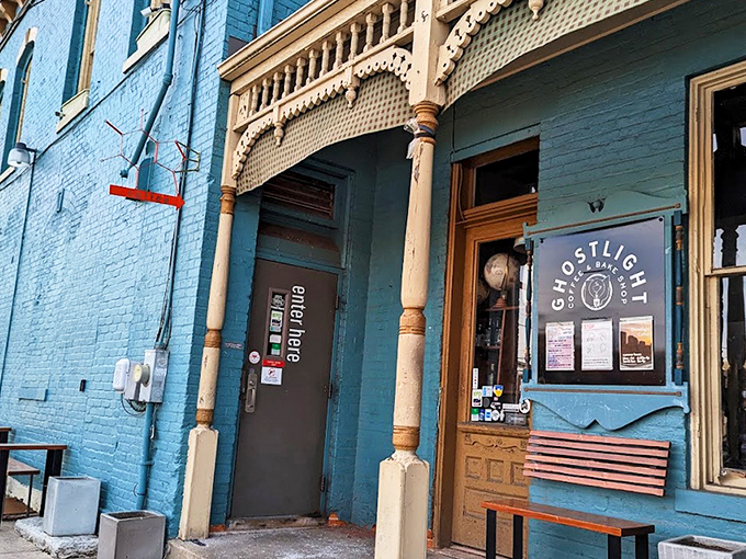 The blue Victorian facade of Ghostlight Coffee isn't just eye-catching&mdash;it's a promise that what awaits inside isn't your average caffeine pit stop.
