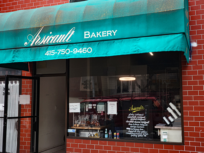 The teal awning beckons like a pastry lighthouse, guiding hungry souls to this unassuming corner of buttery paradise in San Francisco's Richmond District.