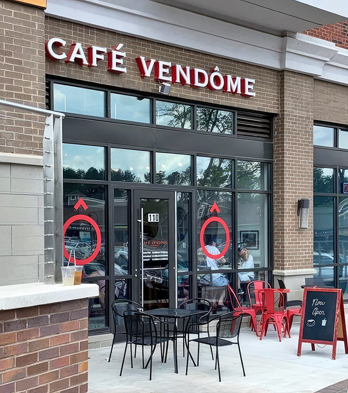 The unassuming storefront of Caf&eacute; Vend&ocirc;me beckons with its bright red sign &ndash; a Parisian lighthouse calling hungry sailors home to buttery shores.